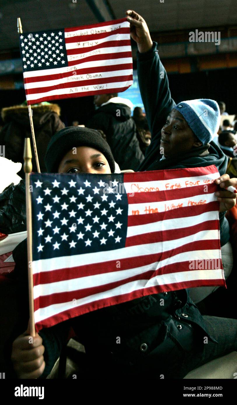 Shareef Harrison, 9, left, and Cheryl Odom, right, show off their ...