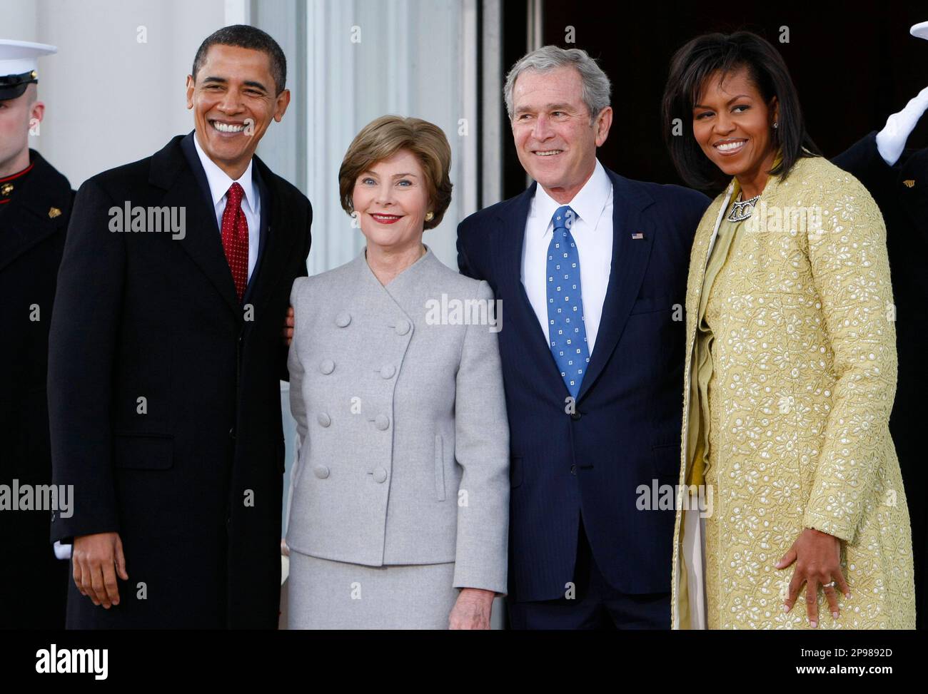 President Bush, center right, and first lady Laura Bush, center left ...