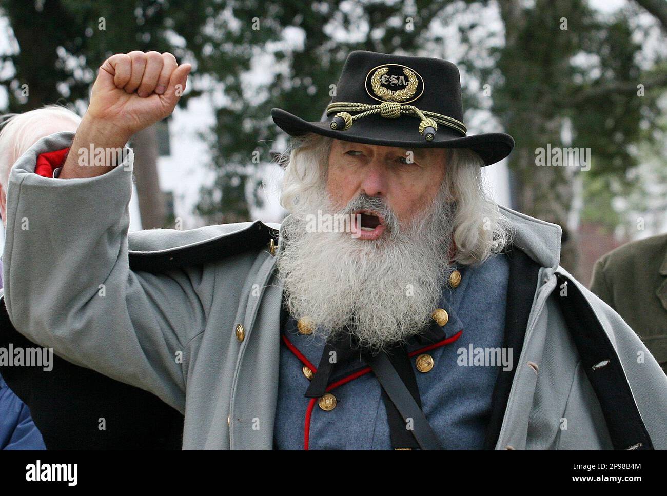 Bill Anthony of Tallassee, Ala., cheers at the end of singing "Dixie ...