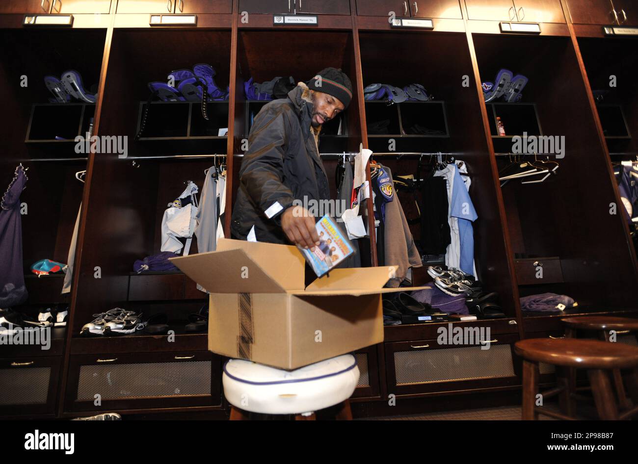 Baltimore Ravens wide receiver Derrick Mason packs up his belongings as ...