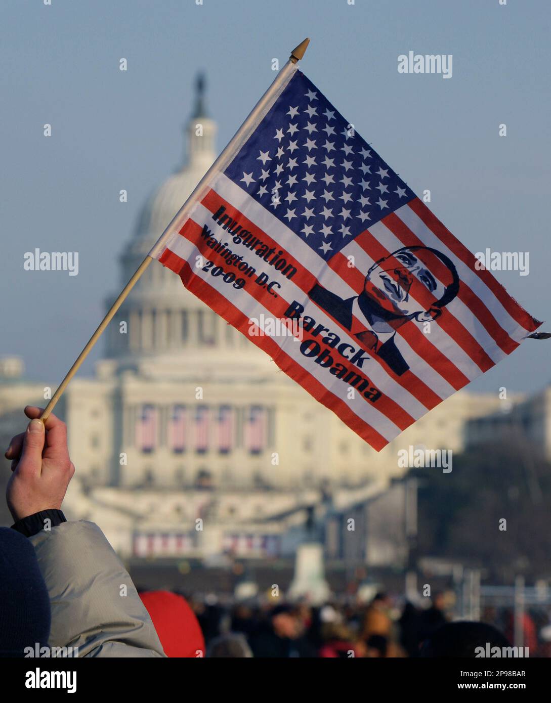 David Serino from Washington holds a flag for sale for $10 on the ...