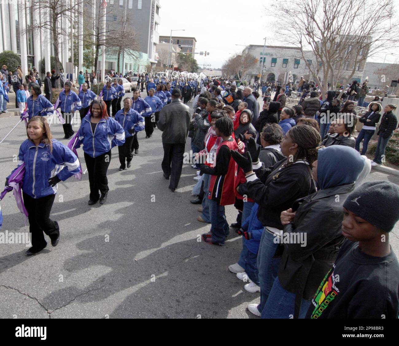 Thousands line the streets of downtown Meridian, Miss. Monday, Jan. 19 ...