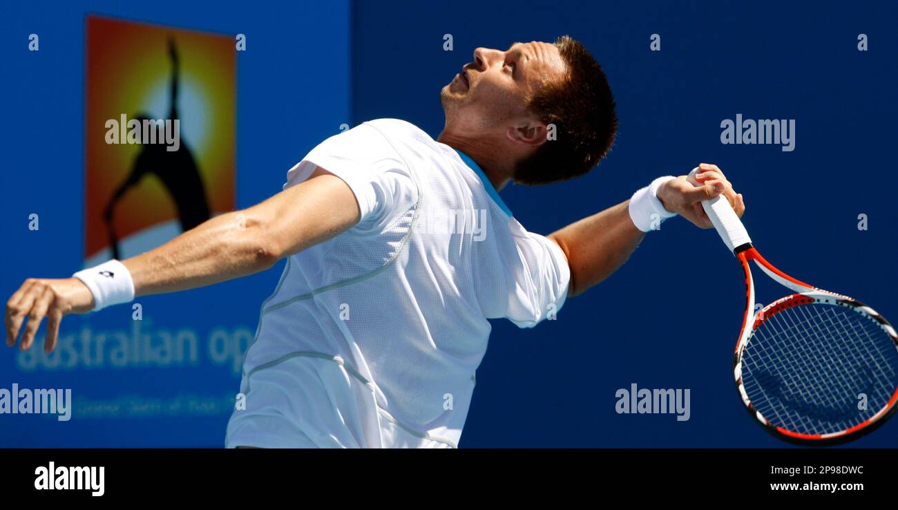 Robin Soderling of Sweden serves to Robert Kendrick of the U.S., during ...
