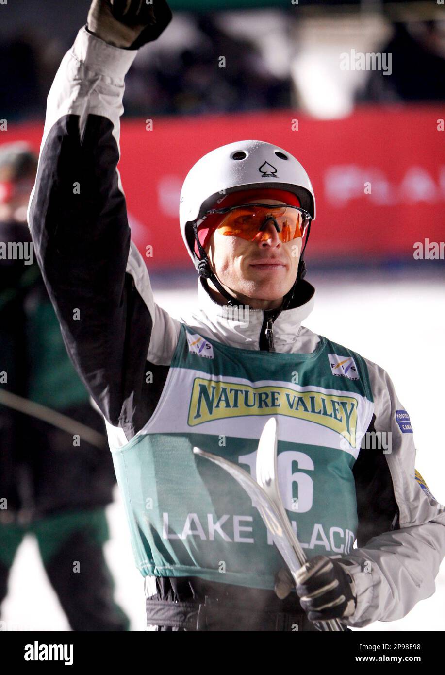 Kyle Nissen, of Canada, waves to the crowd after his final round jump ...