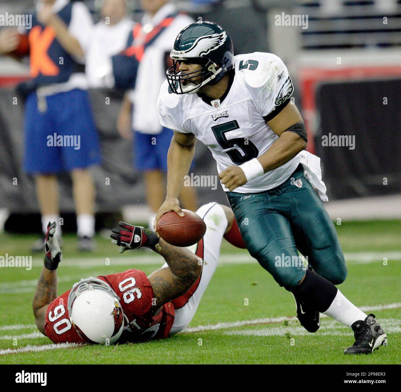 Philadelphia Eagles quarterback Donovan McNabb eludes Arizona Cardinals ...