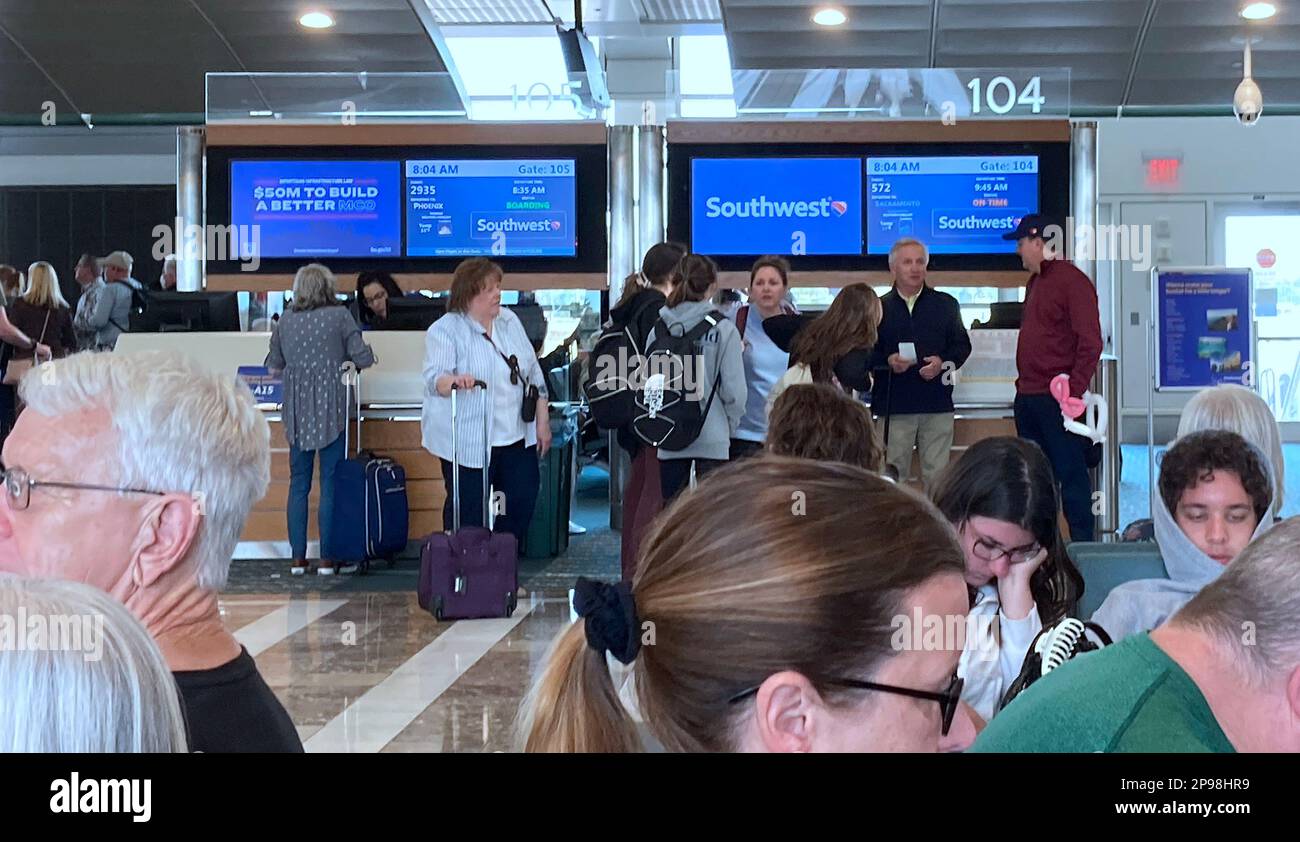 Orlando, United States. 10th Mar, 2023. Travelers wait to board a ...