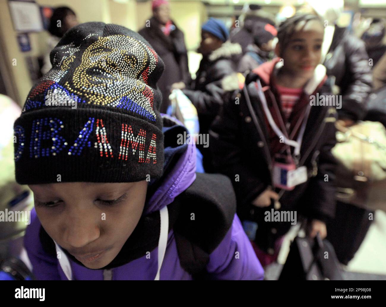 Joyvon Dickerson 11, waits in line at the Amtrak ticket counter at ...