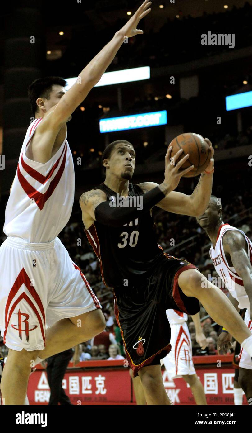 Miami Heat's Michael Beasley (30) goes for two points against Houston ...