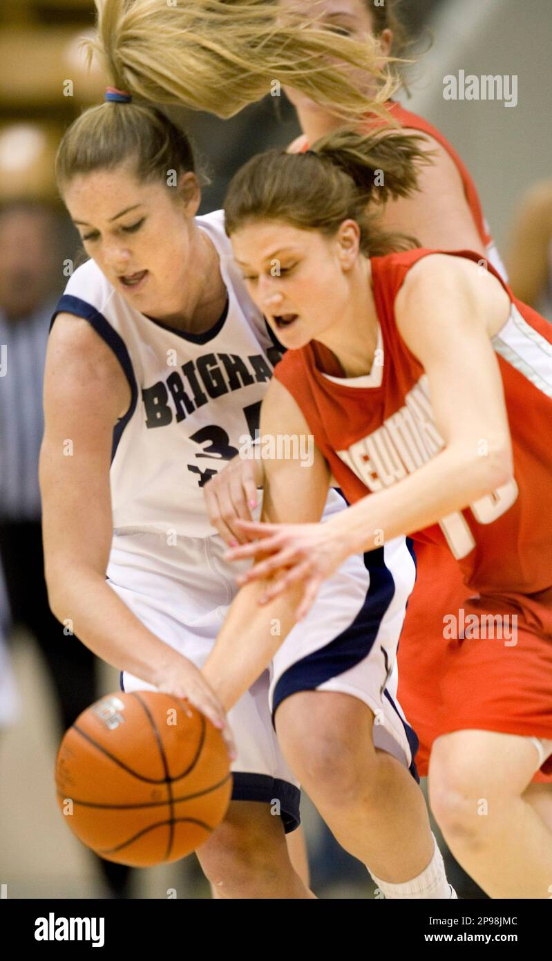 BYU forward Kristen Riley (35) and New Mexico guard Amy Beggin (10) vie ...