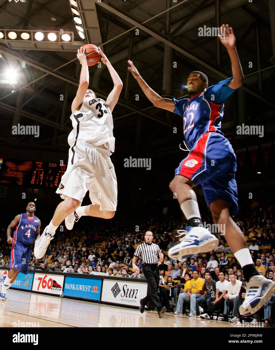 Colorado forward Austin Dufault (33) goes up for a shot against Kansas ...