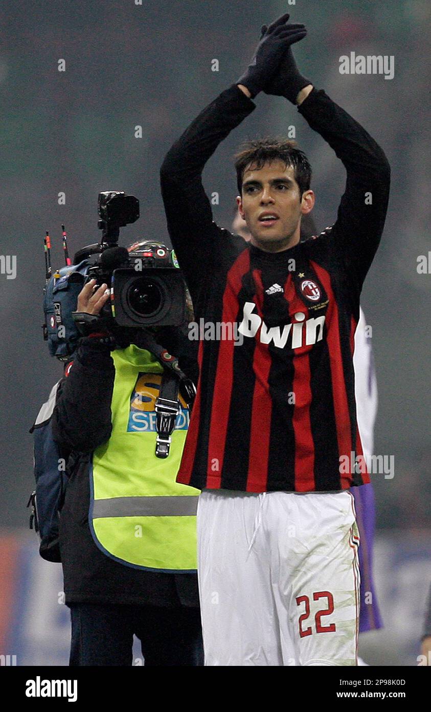 A cameraman shoots video as AC Milan Brazilian forward Kaka raises his ...