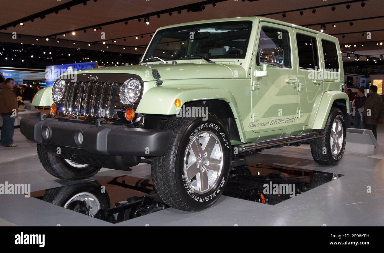 A Jeep Wrangler Unlimited Electric Vehicle is seen on display during ...