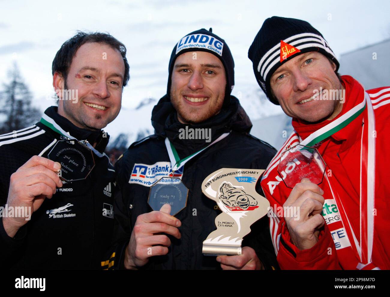 Gold medal winner Frank Rommel from Germany, center, silver medal ...