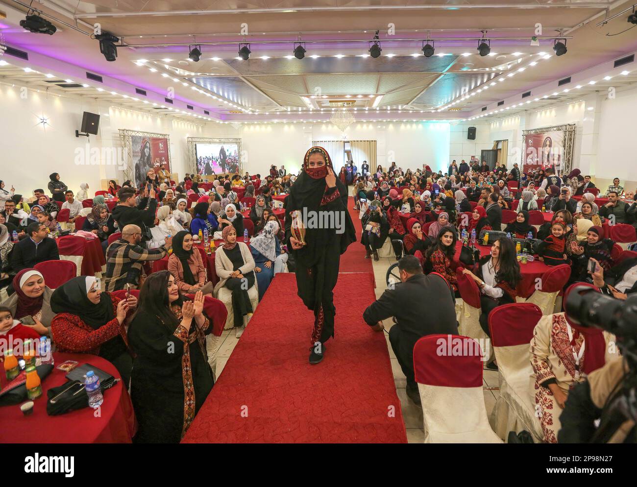 Gaza, Palestine. 9th Mar, 2023. A Palestinian young lady wearing ...