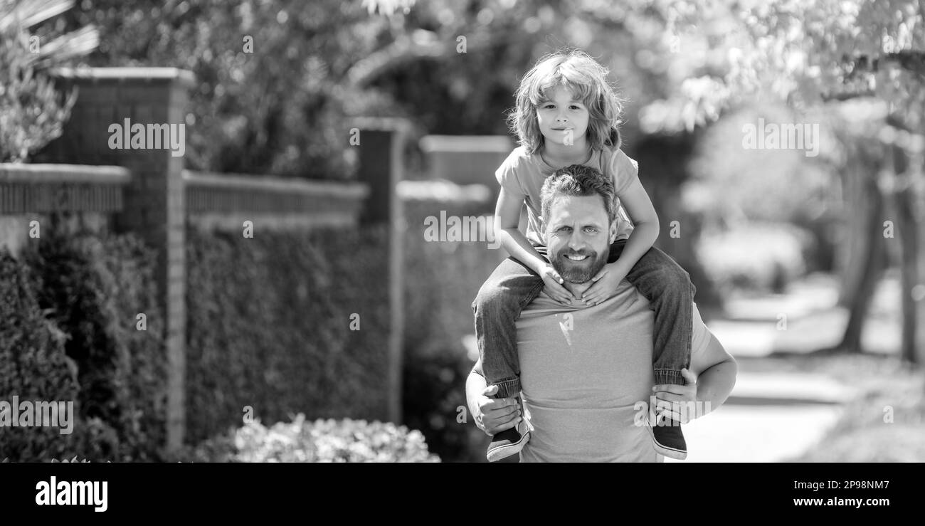 parenting and fatherhood. fathers day. happy father and son having fun ...