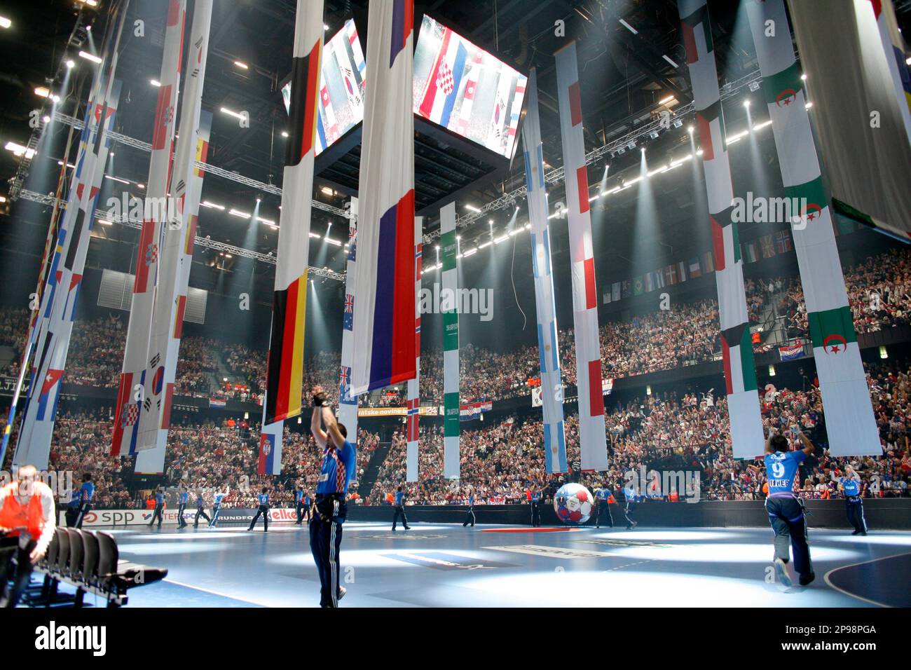 Flags of participating nations are displayed during the opening ...