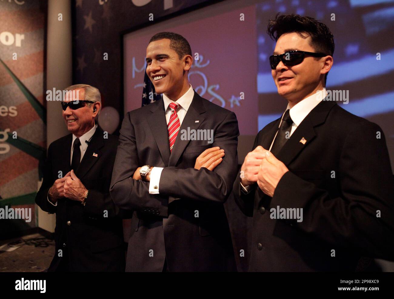 Dressed as Secret Service agents, Chuck Robinson, left, and D.P ...