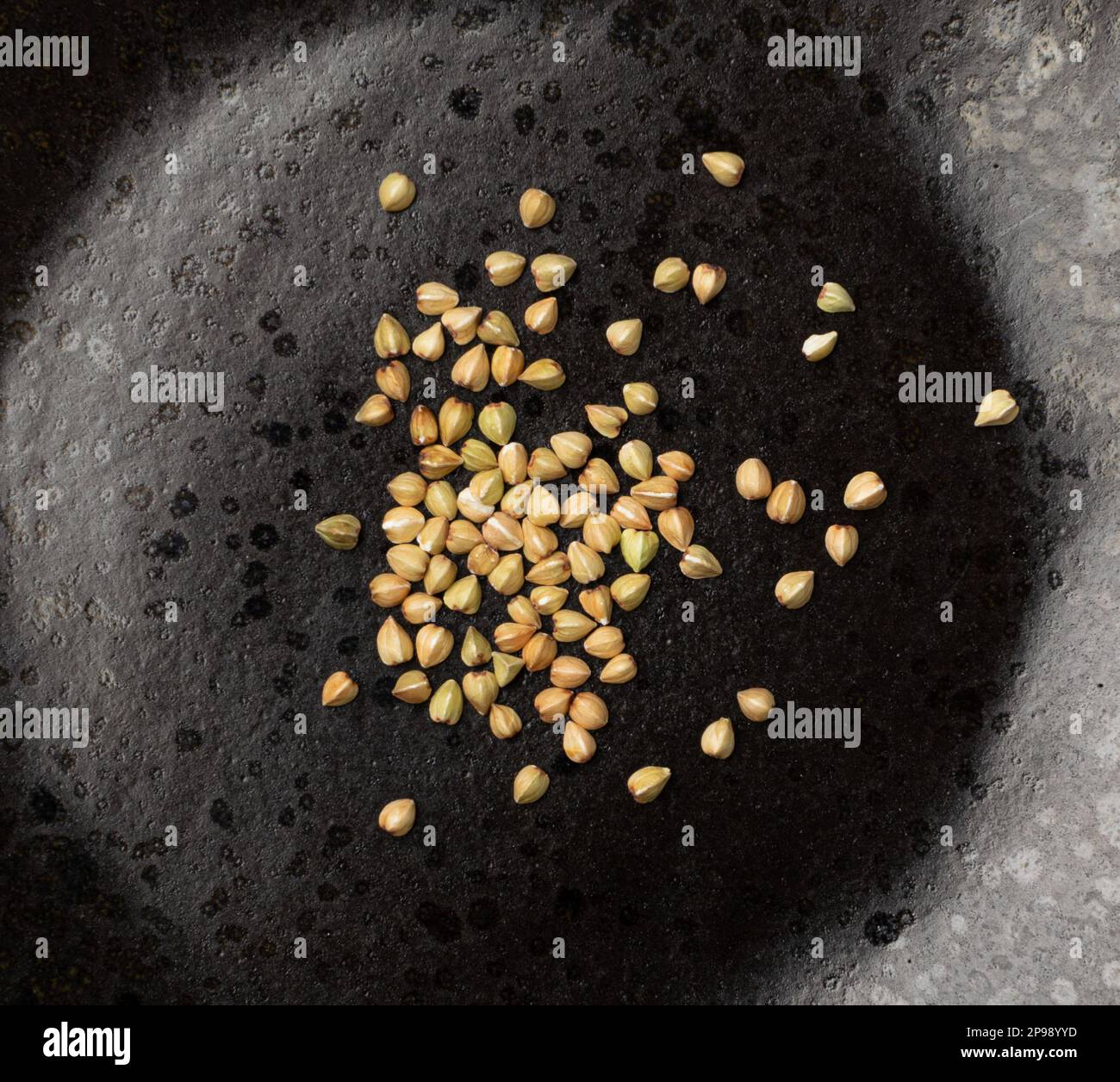 Raw Green Buckwheat Seeds on Black Plate Isolated, Dry Buck Wheat ...