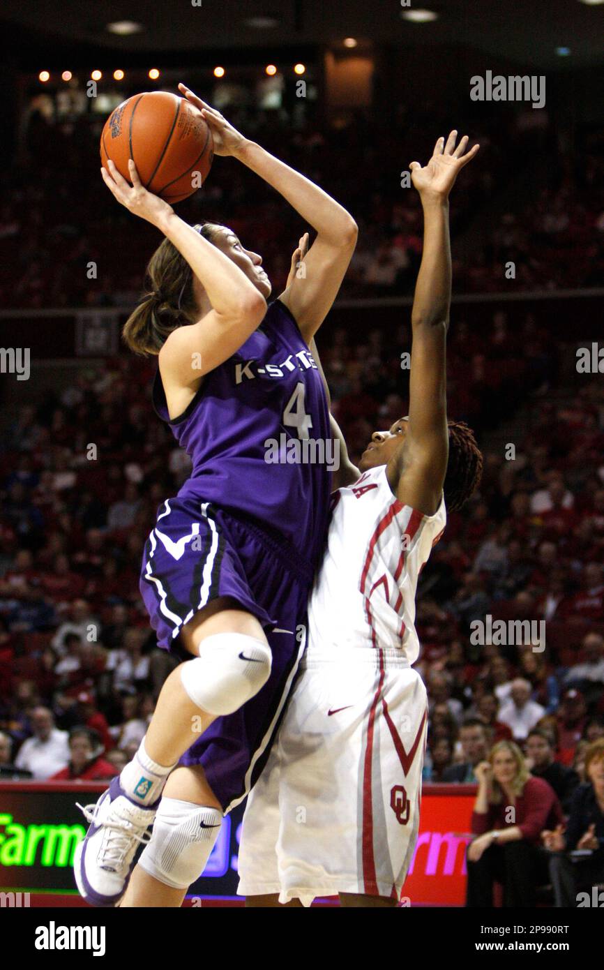Kansas State's Ashley Sweat, left, shoots as Oklahoma's Danielle ...