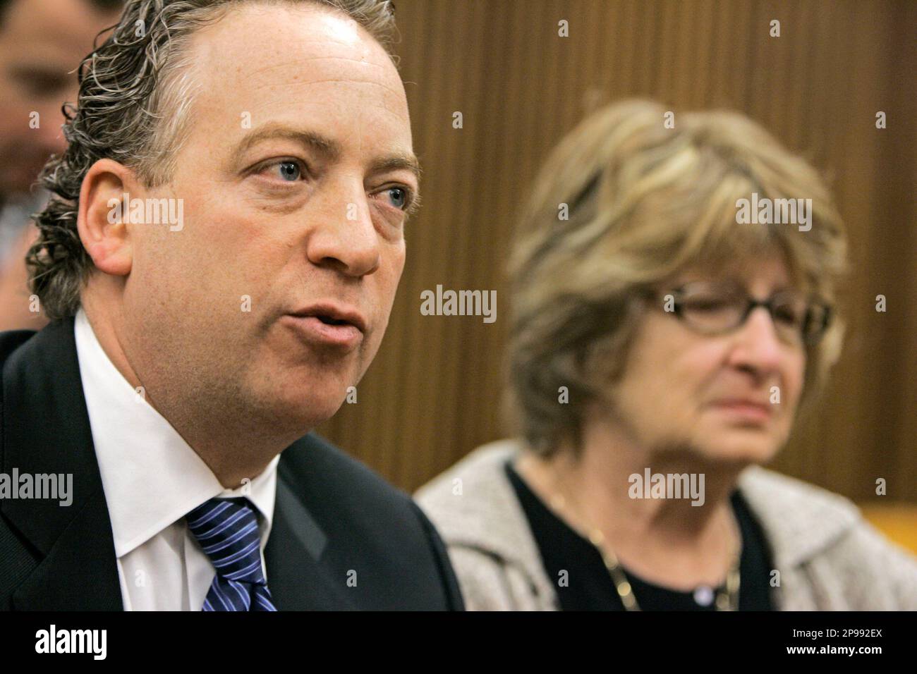 Dominic DiPuccio, brother of Rosemarie Essa, answers questions at a ...