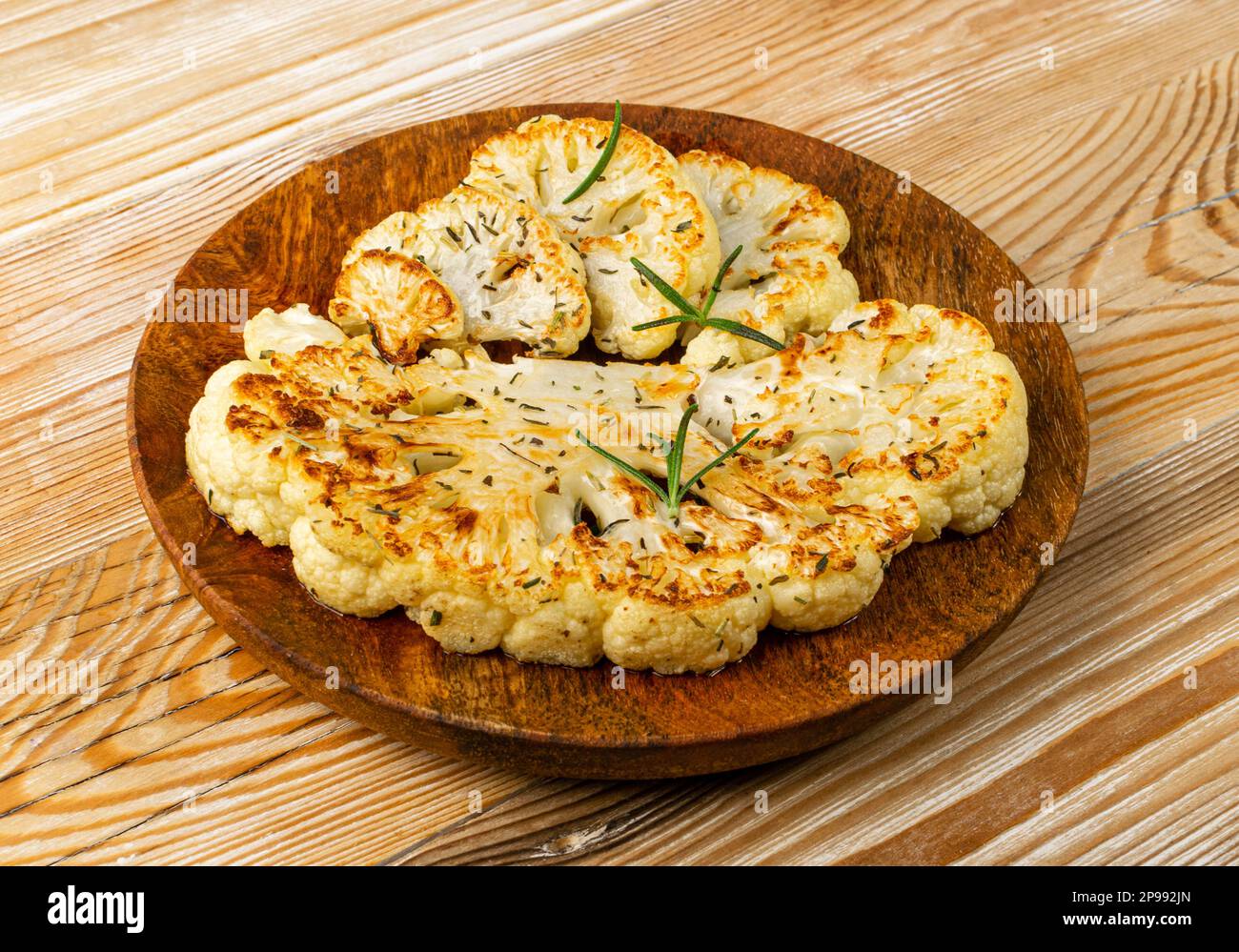 Fried Cauliflower Slices on Wood Plate, Baked Cauliflower Steaks ...