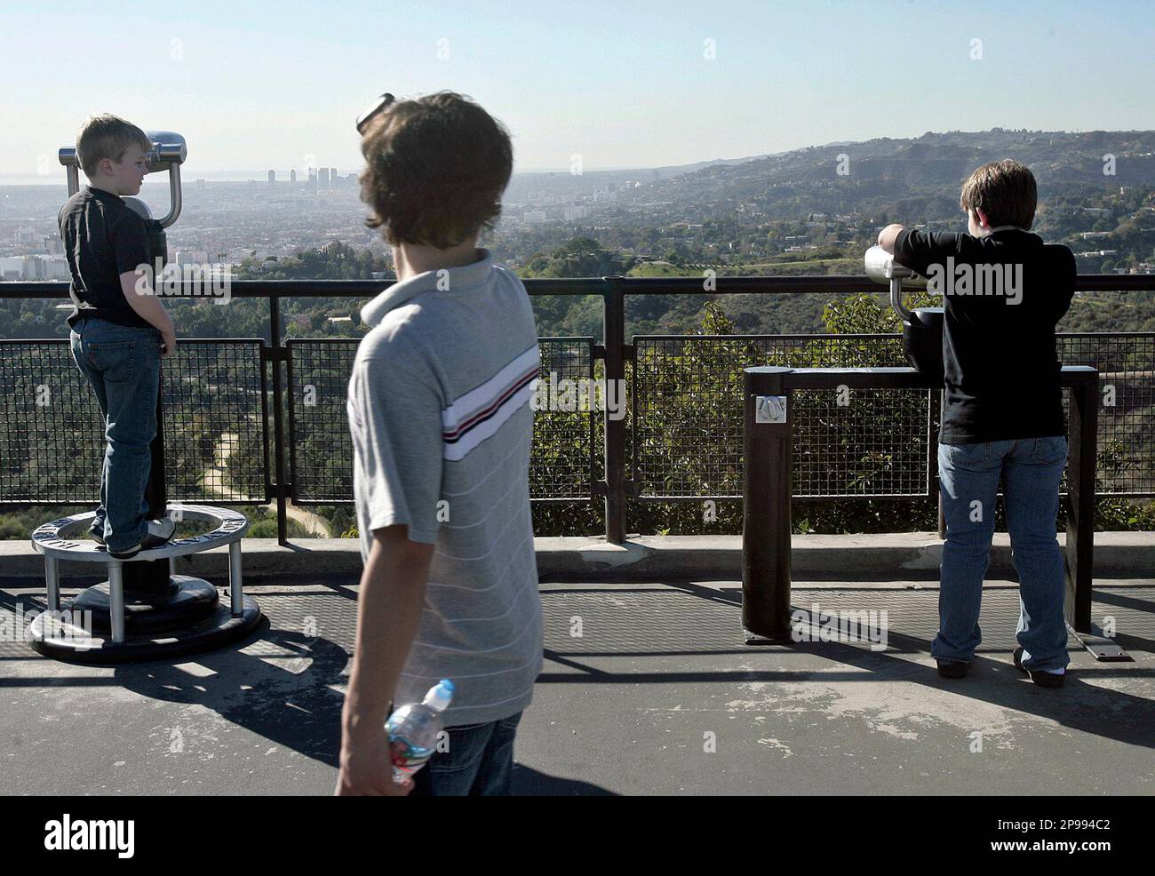 Conrad Rasque, 8, left, and Camdyn Rasque, 10, right, view the ...