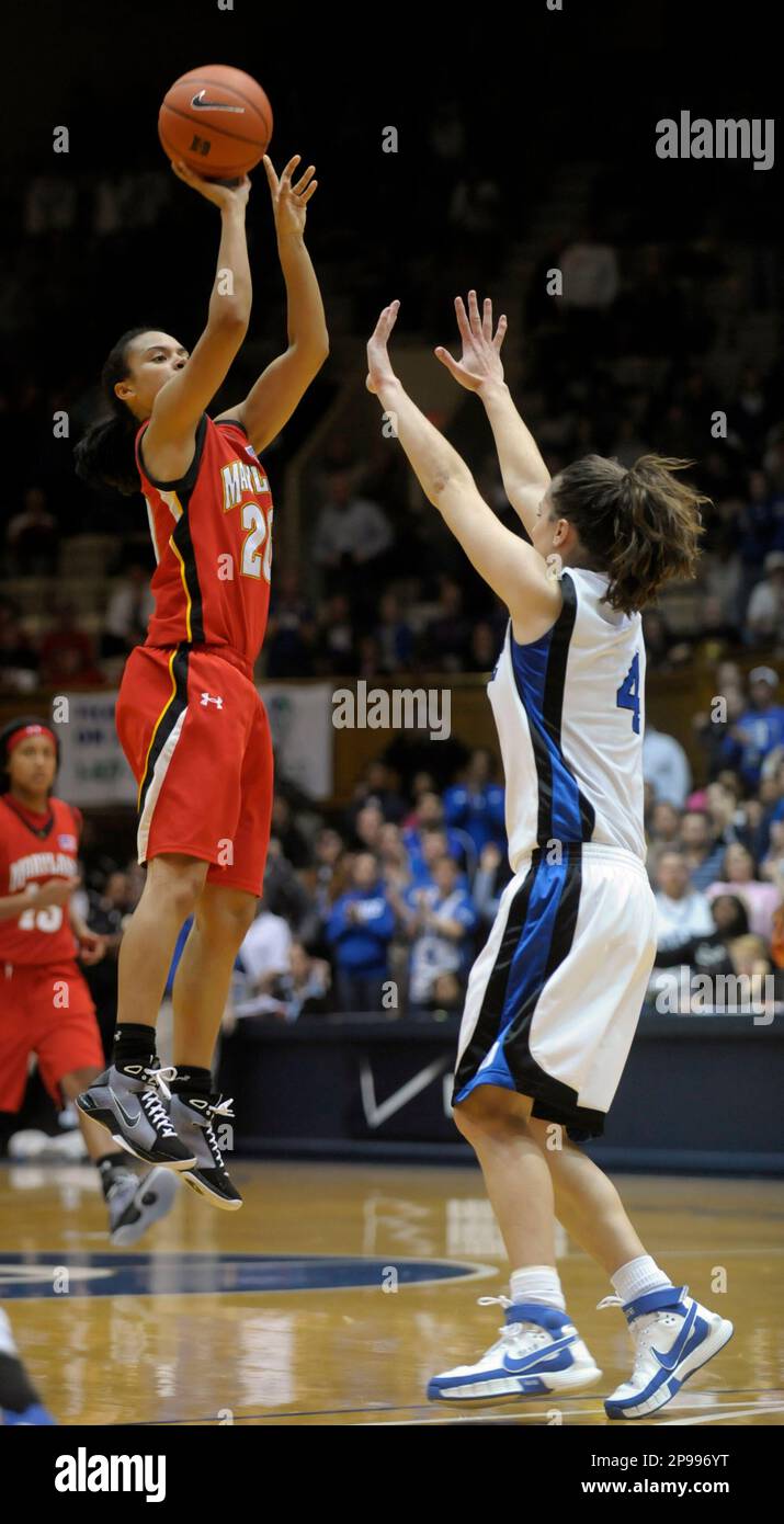 Maryland's Kristi Toliver (20) shoots over Duke's Abby Waner (4) in the ...