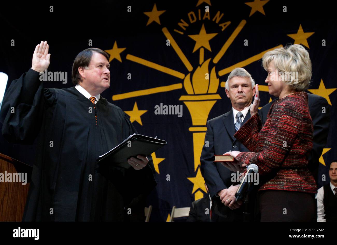 Indiana Lt. Gov. Becky Skillman, right, takes the oath of office from ...