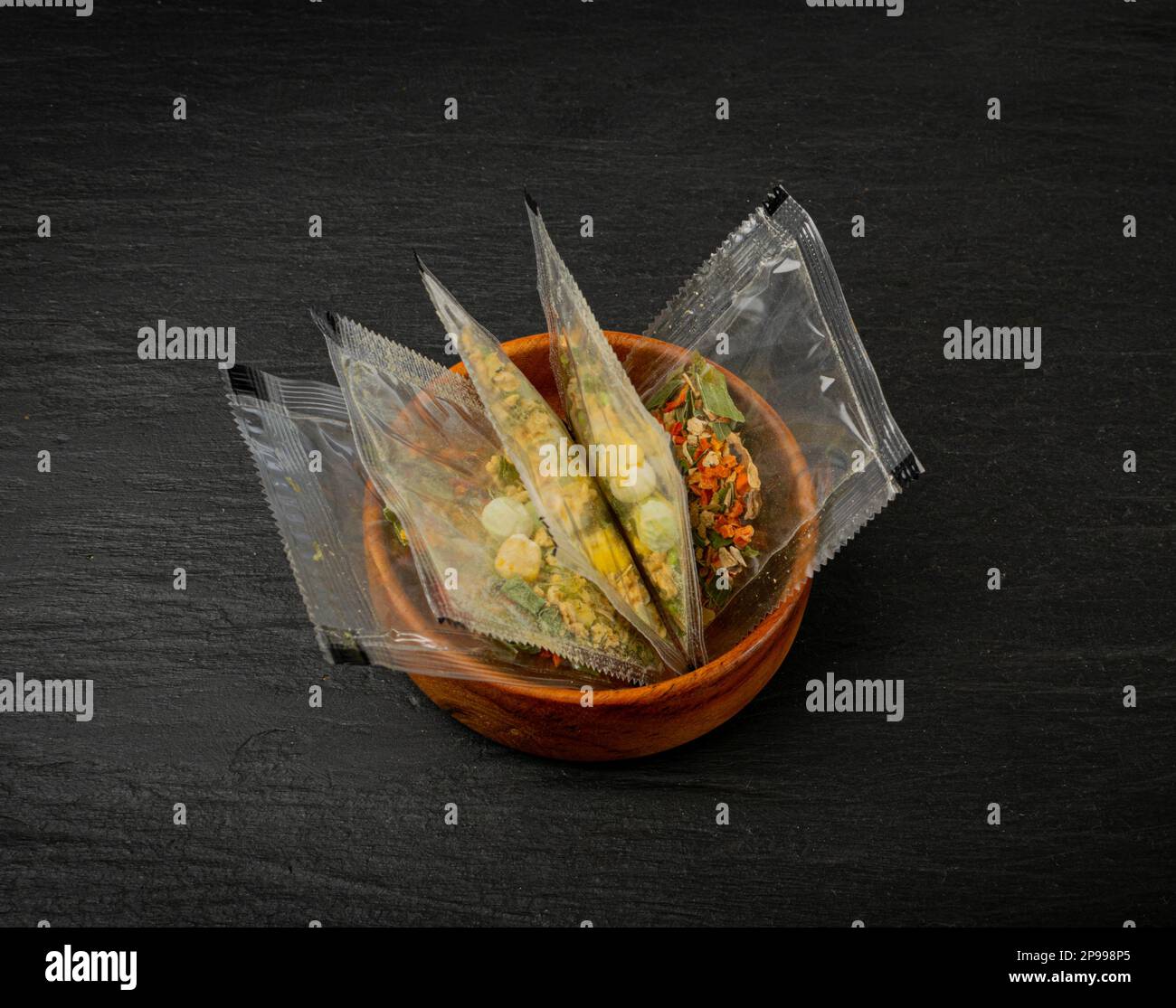 Small Spice Pouch on Black Background, Dried Vegetables and Herbs Mix ...