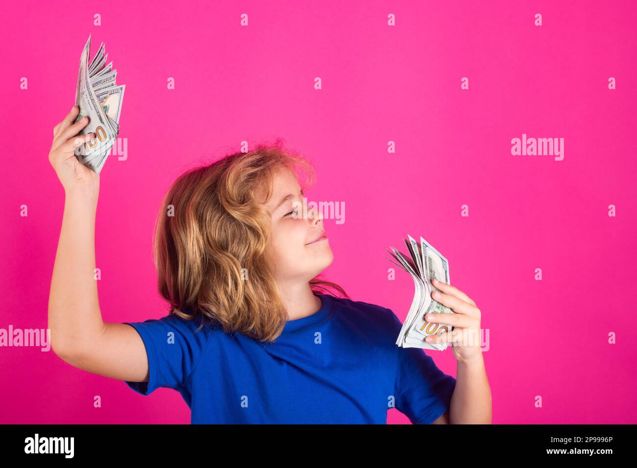 Studio portrait of child with money banknotes. Kid with money for ...
