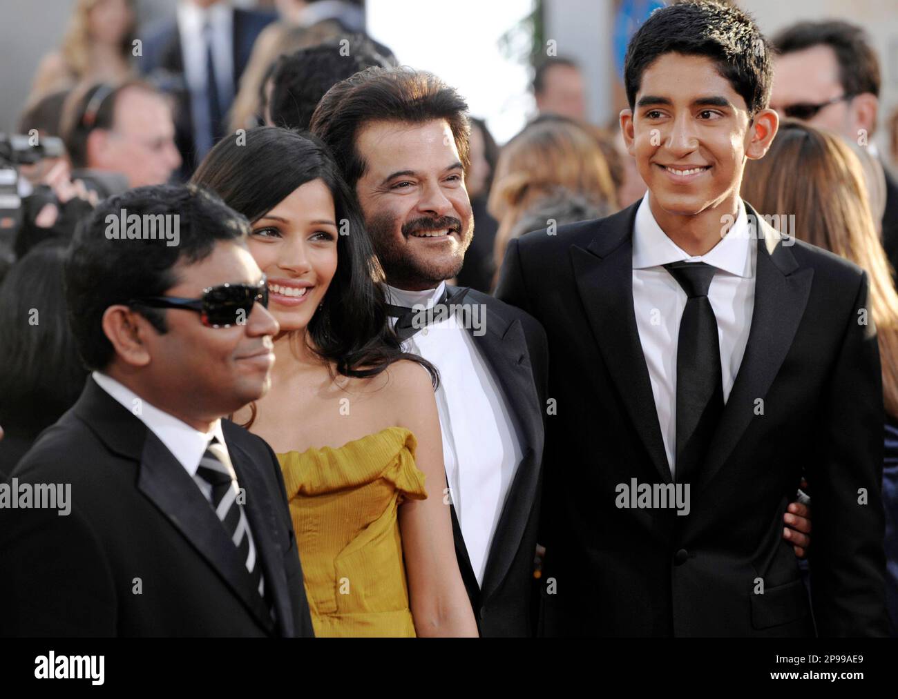 The cast of "Slumdog Millionaire" arrive at the 66th Annual Golden ...