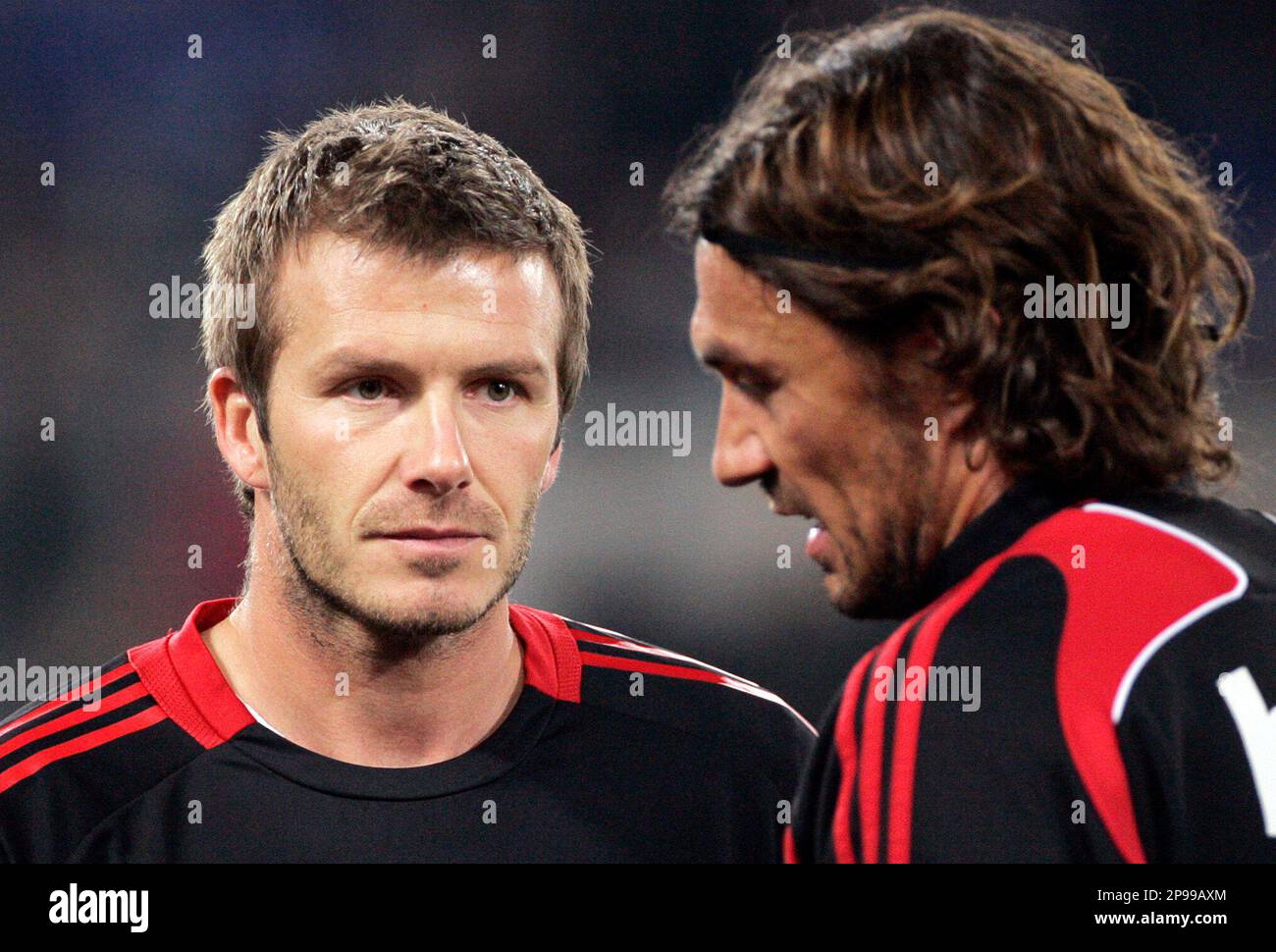 AC Milan soccer star David Beckham, of Britain, looks on with his ...