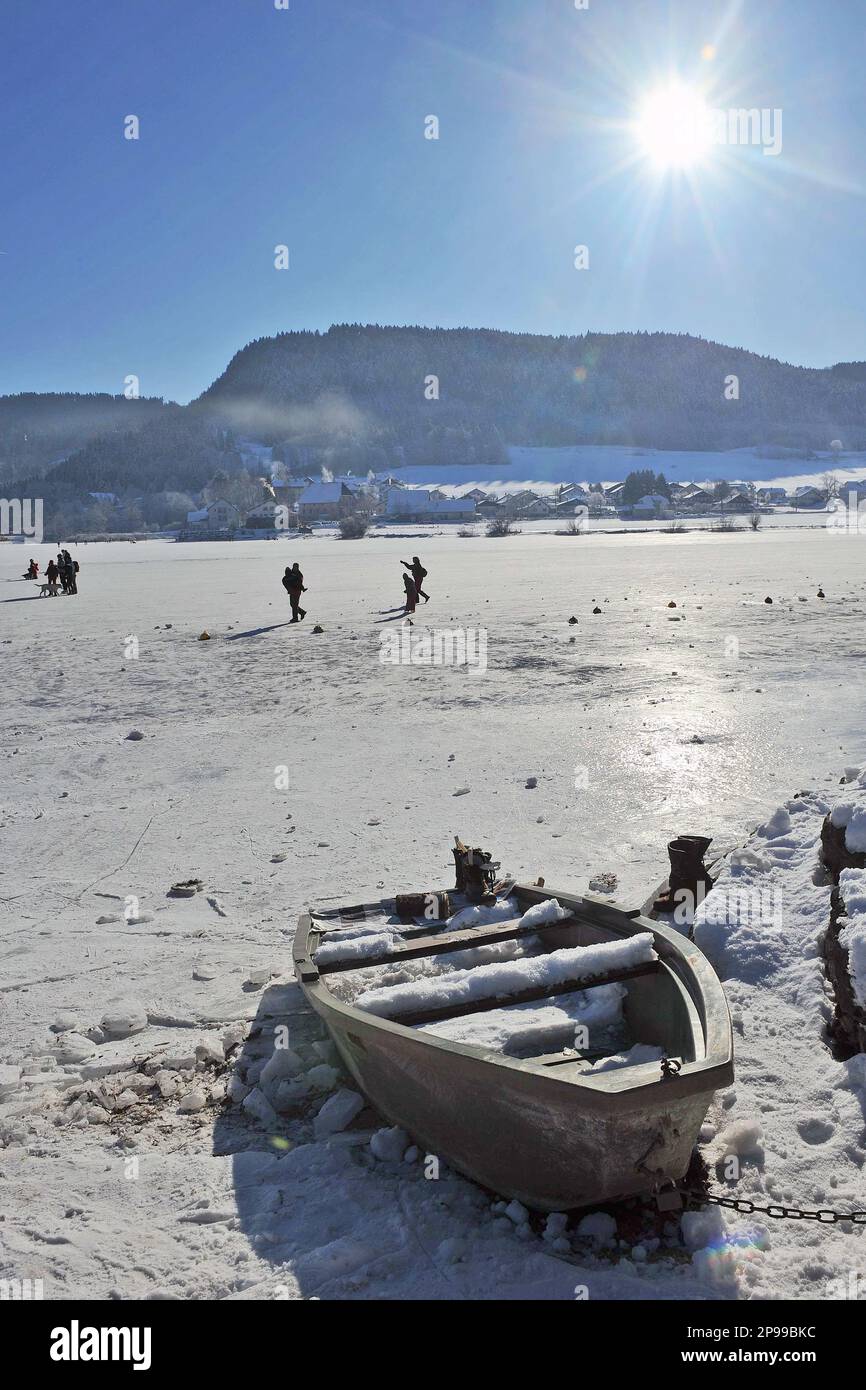 People enjoy skating on the frozen Lake of Brenets in the Canton of ...