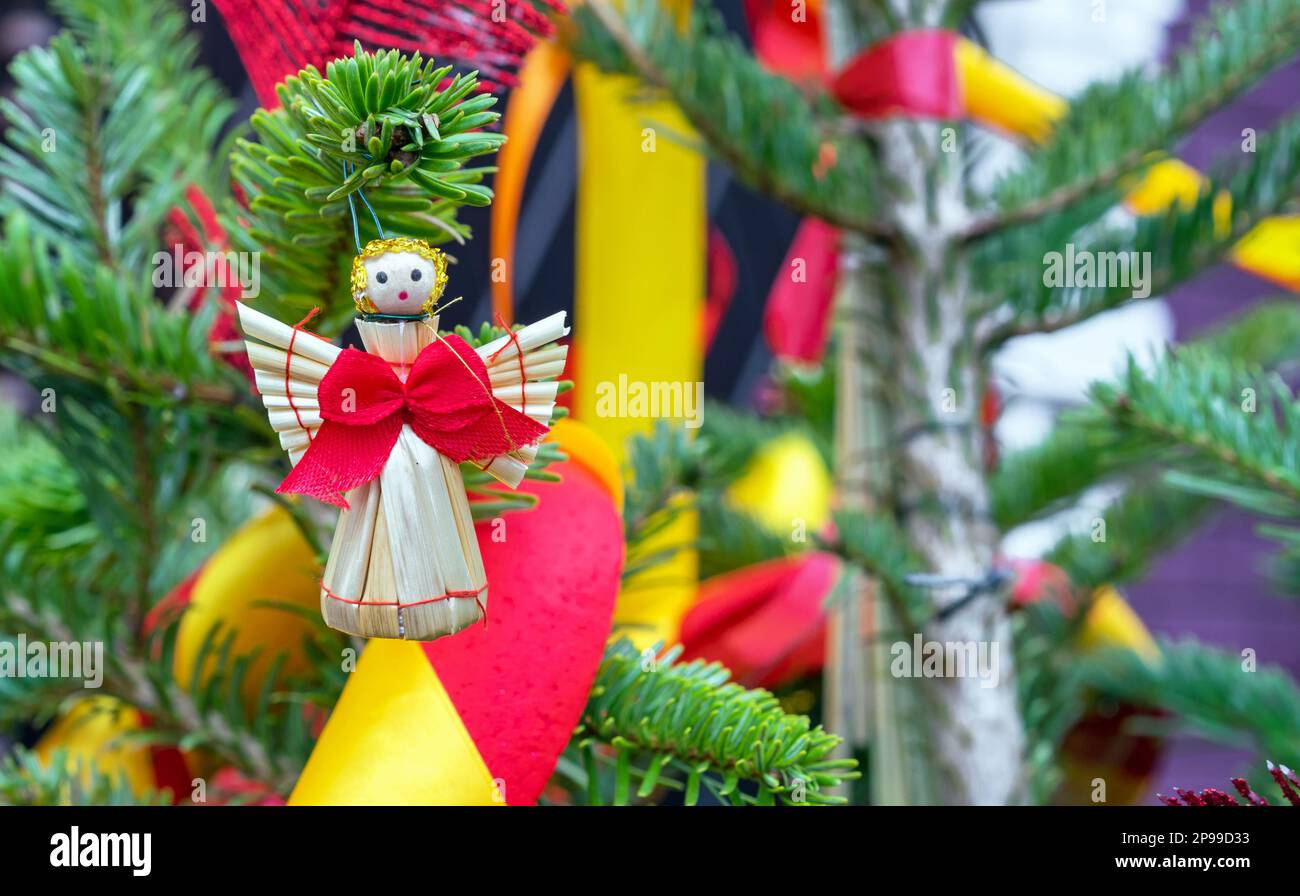 Scandinavian straw angel with red bow ?? the christmas tree Stock Photo ...