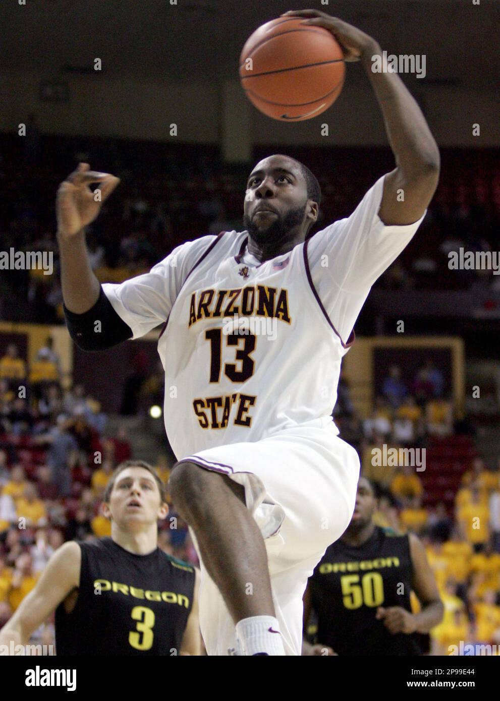 Arizona State guard James Harden goes for two as Oregon's Garret Sim (3 ...