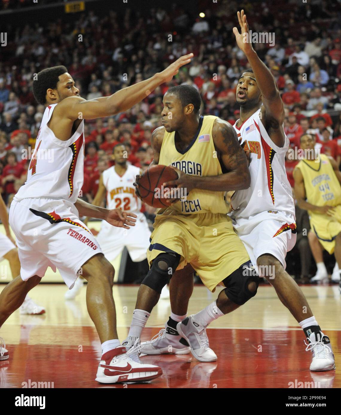 Maryland's Sean Mosely, left, and Landon Milbourne pressure Georgia ...
