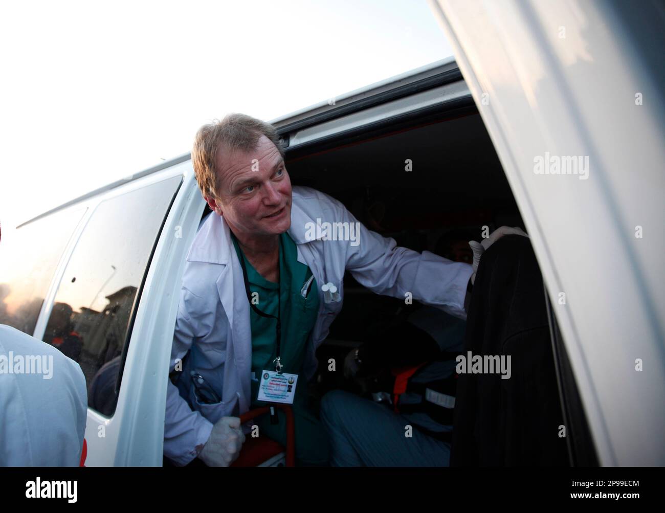 Norwegian doctor Eric Fosse looks out of a Palestinian ambulance after ...
