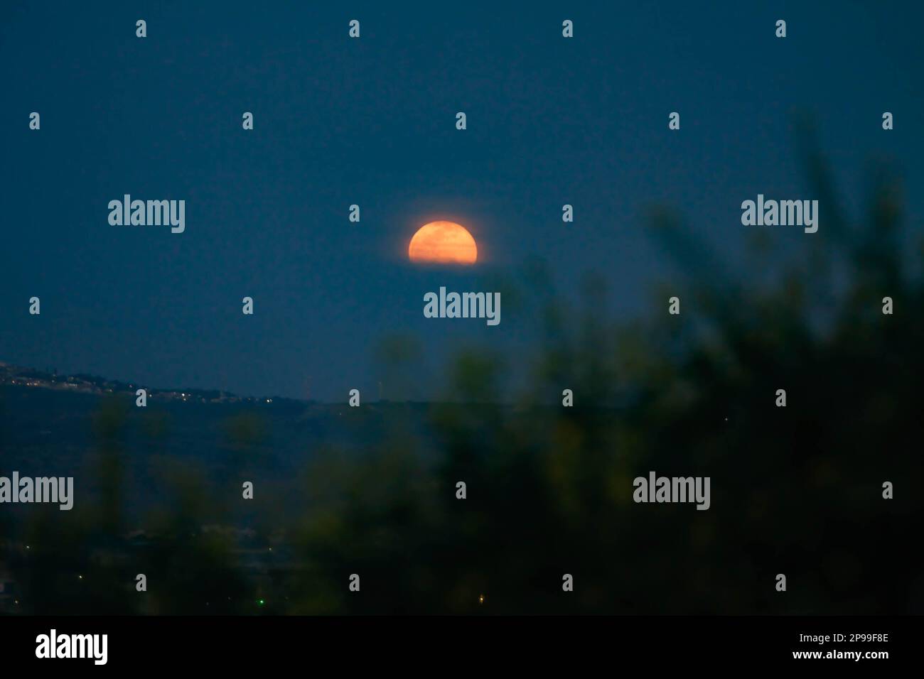 View of the moon over the city of Jenin in the occupied West Bank Stock ...