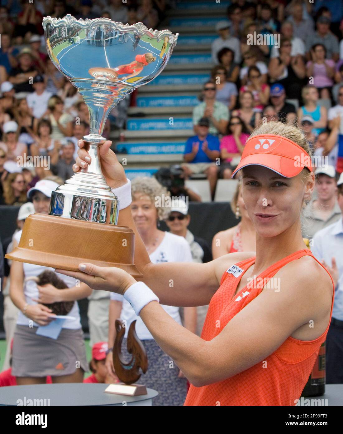 Russia's Elena Dementieva holds her trophy after defeating fellow ...