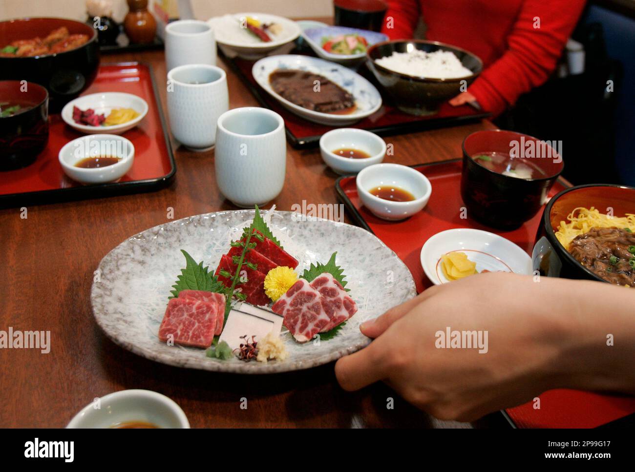 Whale meat sashimi is served at a whale meat eatery in Tokyo in this ...