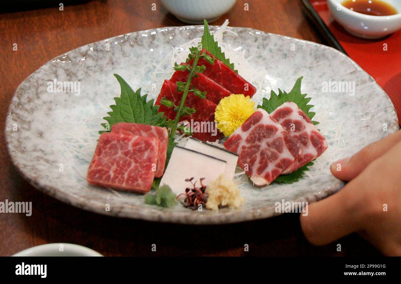 Whale meat sashimi is served at a whale meat eatery in Tokyo in this ...