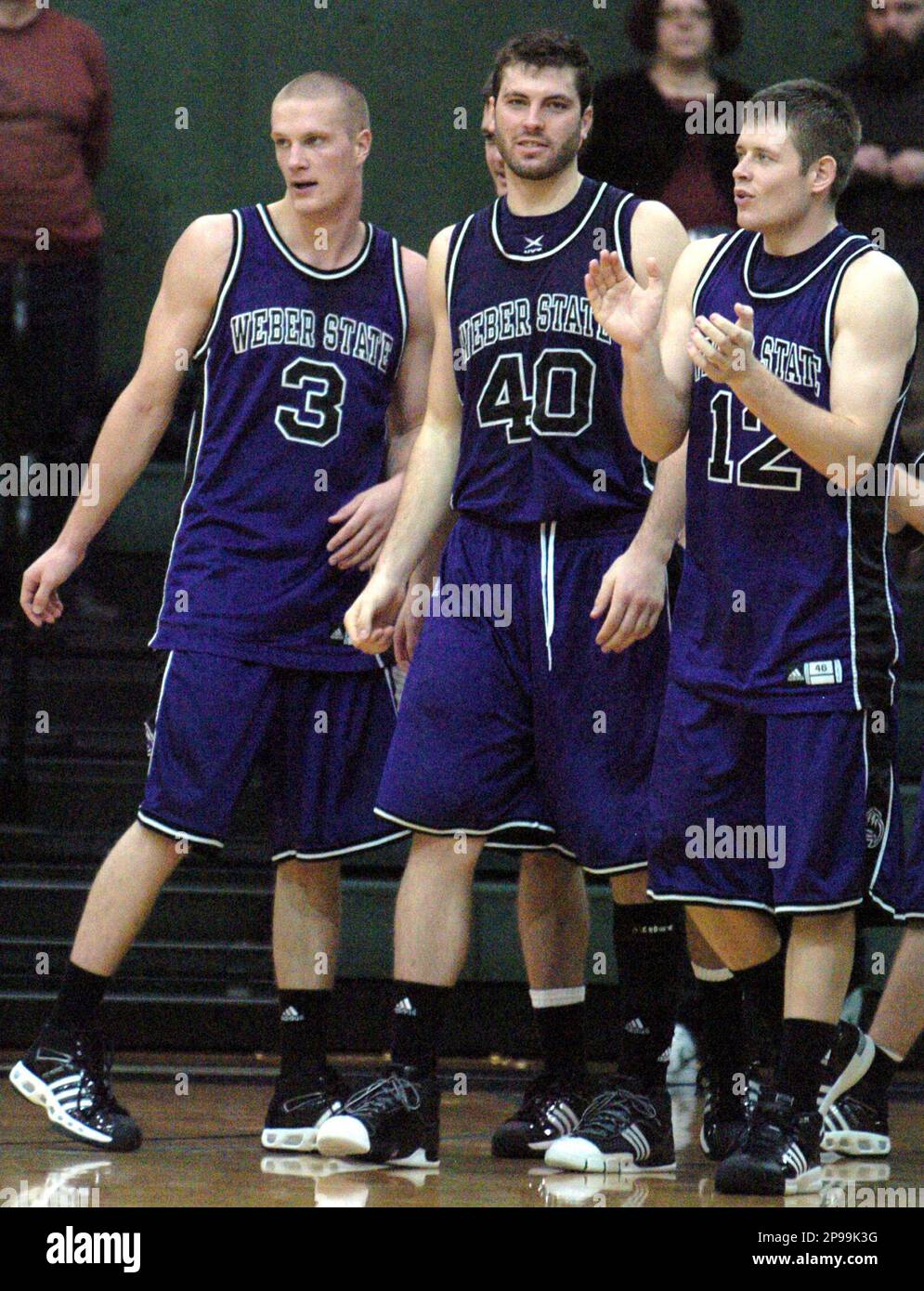 Weber State's Kyle Bullinger (3), Steve Panos (40) and Nick Hansen (12 ...
