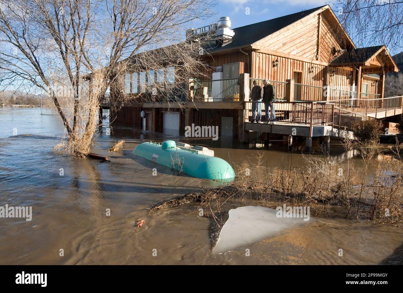 The clubhouse of the River Ridge Golf Course was surrounded by water ...