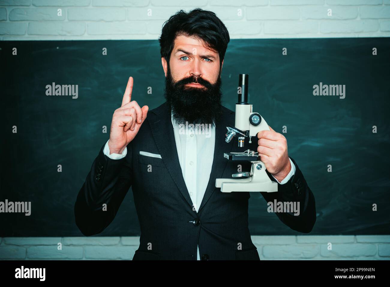 Tired stressed and depressed professor near blackboard. Academic ...