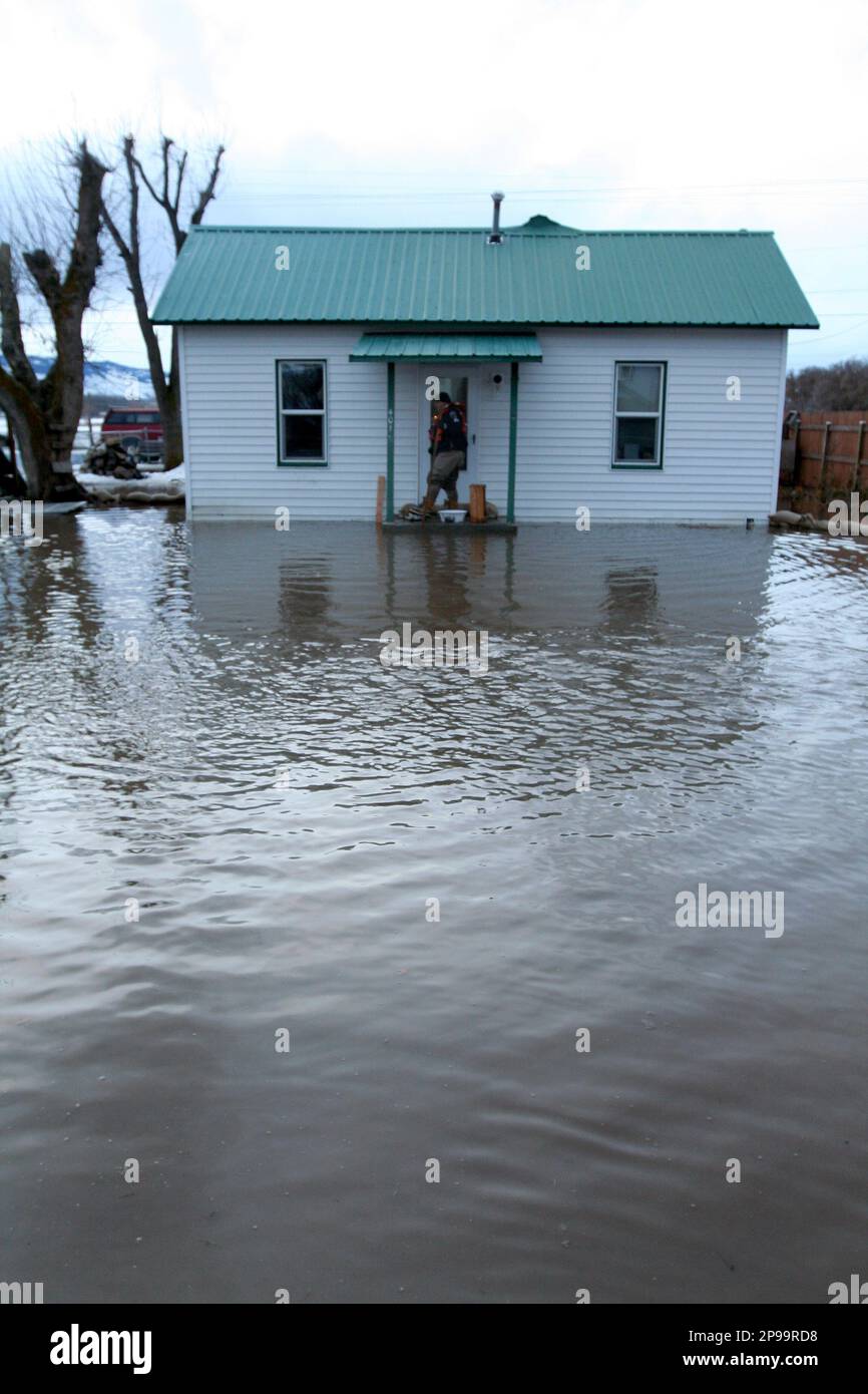 Ellensburg Police Sgt. Brett Koss knocks on the door of a west ...