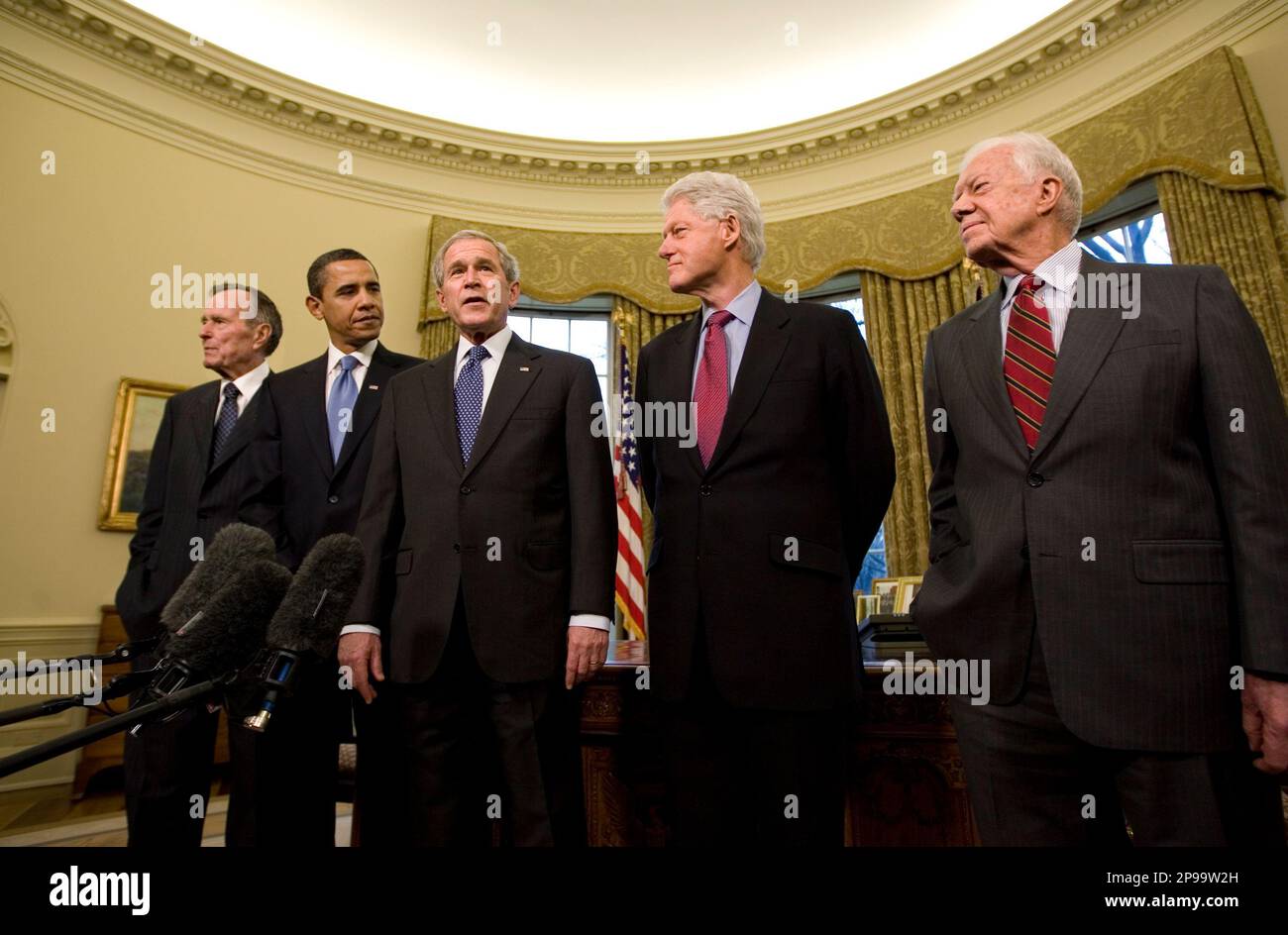 President George W. Bush poses with President-elect Barack Obama, and ...