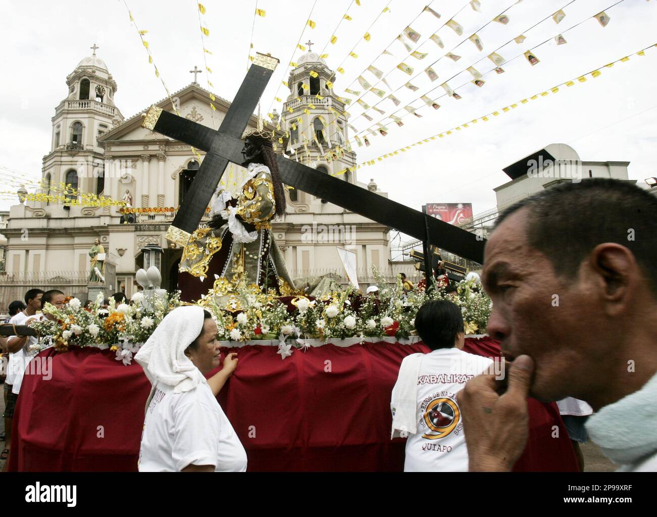 Images of the Black Nazarene, in various sizes, are placed outside the ...