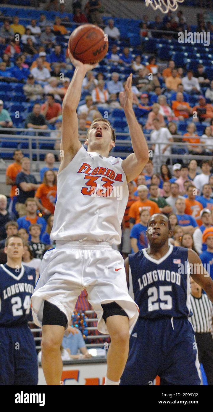 Florida's Nick Calathes (33) goes up for two points as Longwood's ...