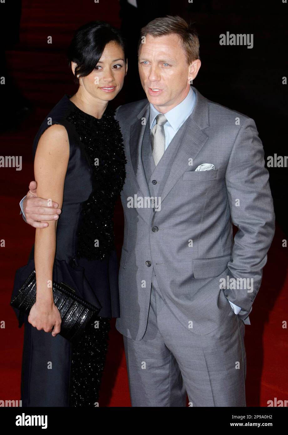 British actor Daniel Craig, right, poses for photographers as he ...