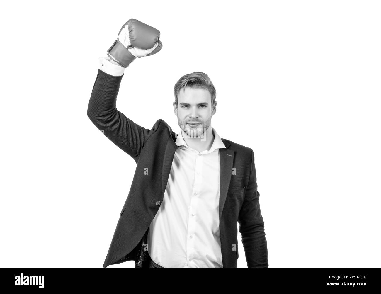 Professional man winner in formal suit with raised boxing glove ...